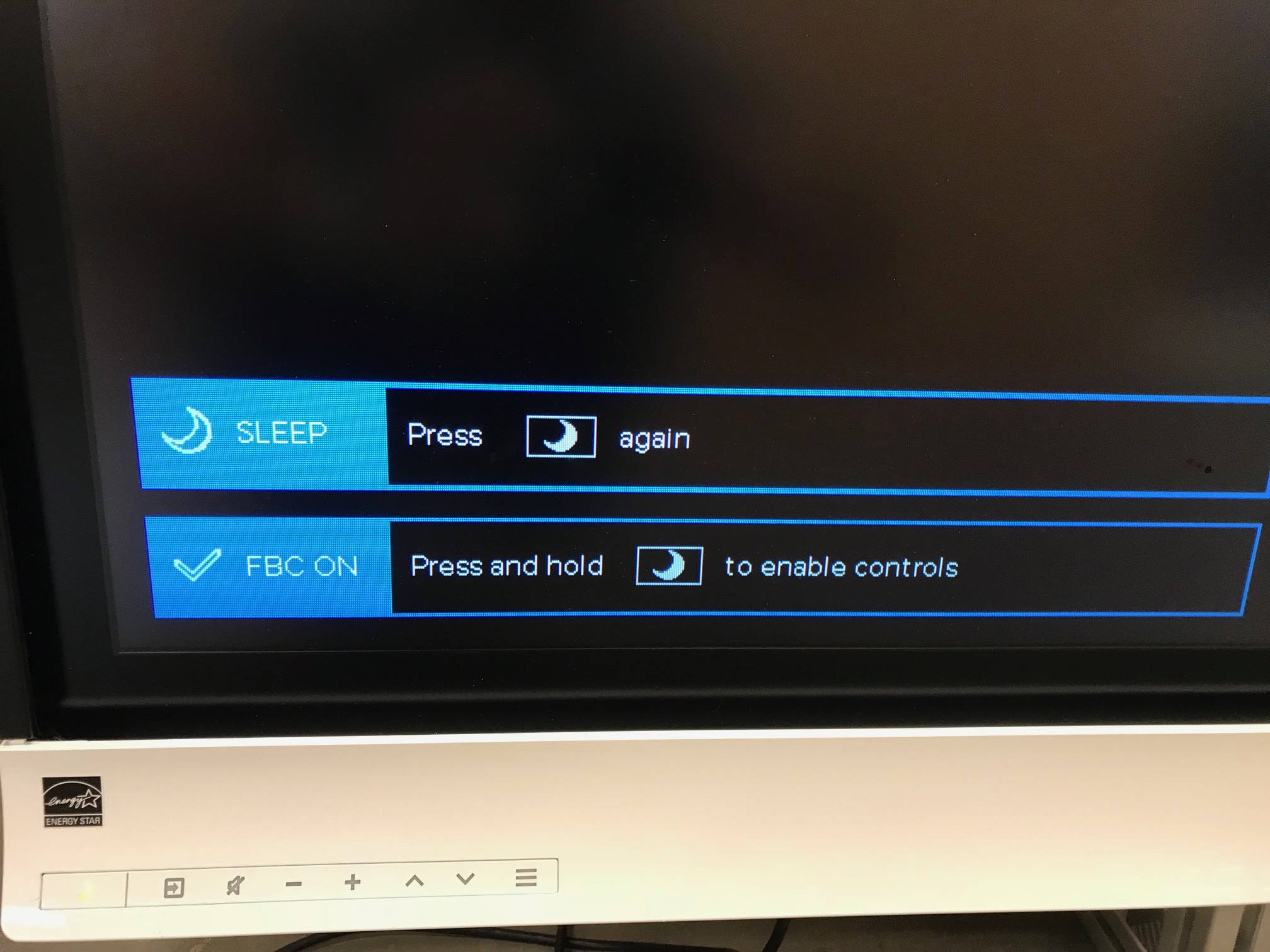 Unlit buttons on the front of the SMART Board interactive flat panels